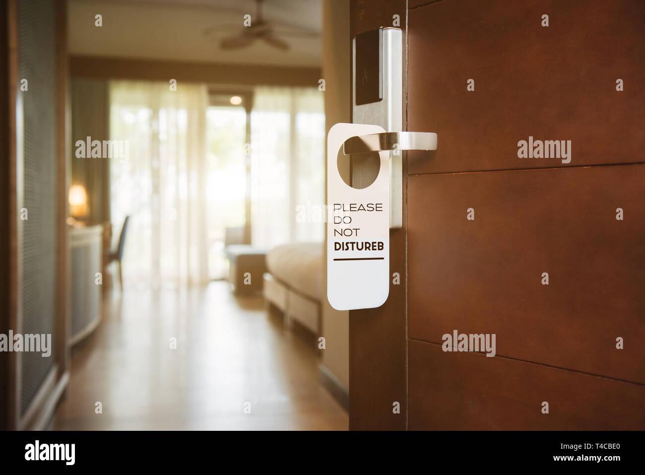Hotel room with please do not disturb sign Stock Photo - Alamy