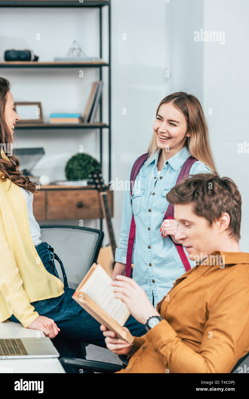 Three students table High Resolution Stock Photography and Images - Alamy