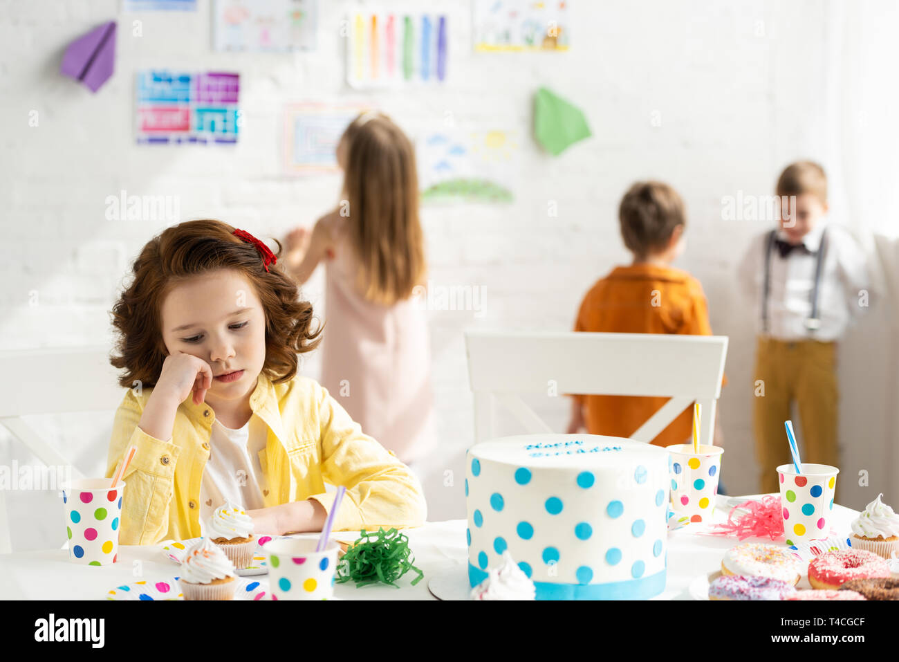 Sad kid at birthday party hi-res stock photography and images - Alamy