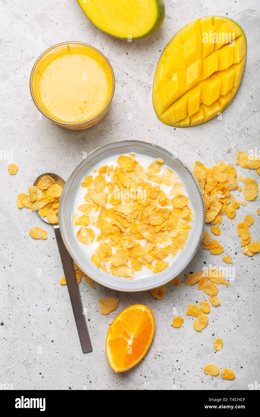 Breakfast which consist of different yellow ingredients - sereales and ...