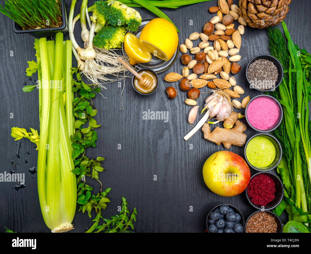 High dietary fibre health food concept with fruit, vegetables, nuts and ...
