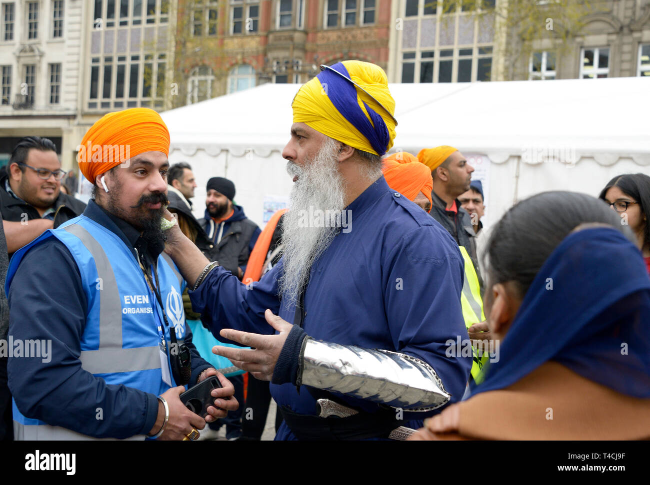 Two Sikh men talking at celebration Stock Photo - Alamy