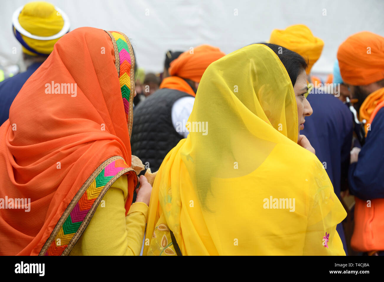 Two Sikh ladies in veils, back view Stock Photo - Alamy