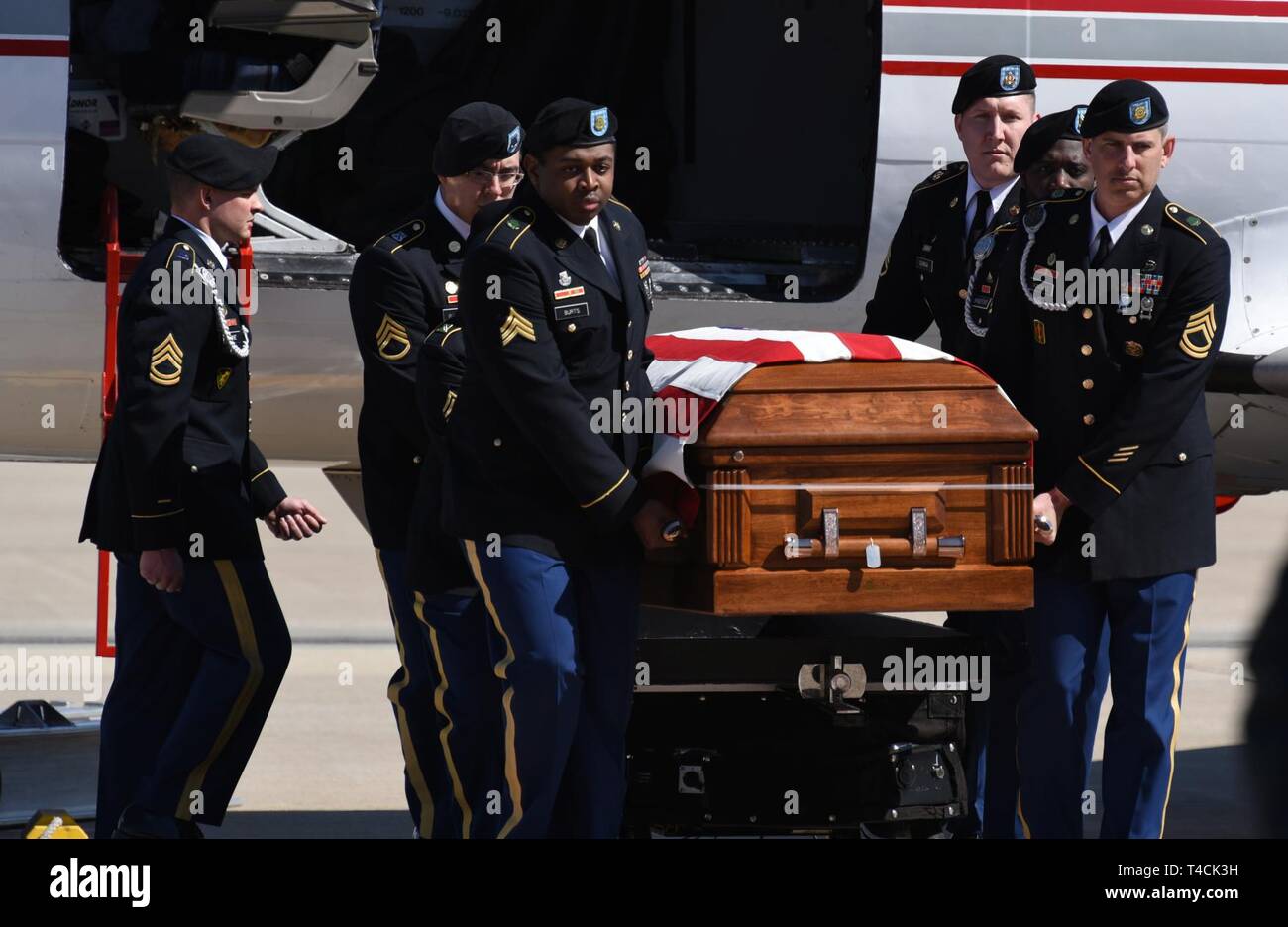 U.S. Army members of the Honor Guard render the proper customs and ...