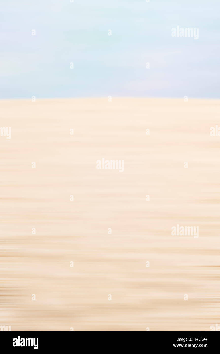 Vertical out of focus blur beach background. Copy space Stock Photo - Alamy
