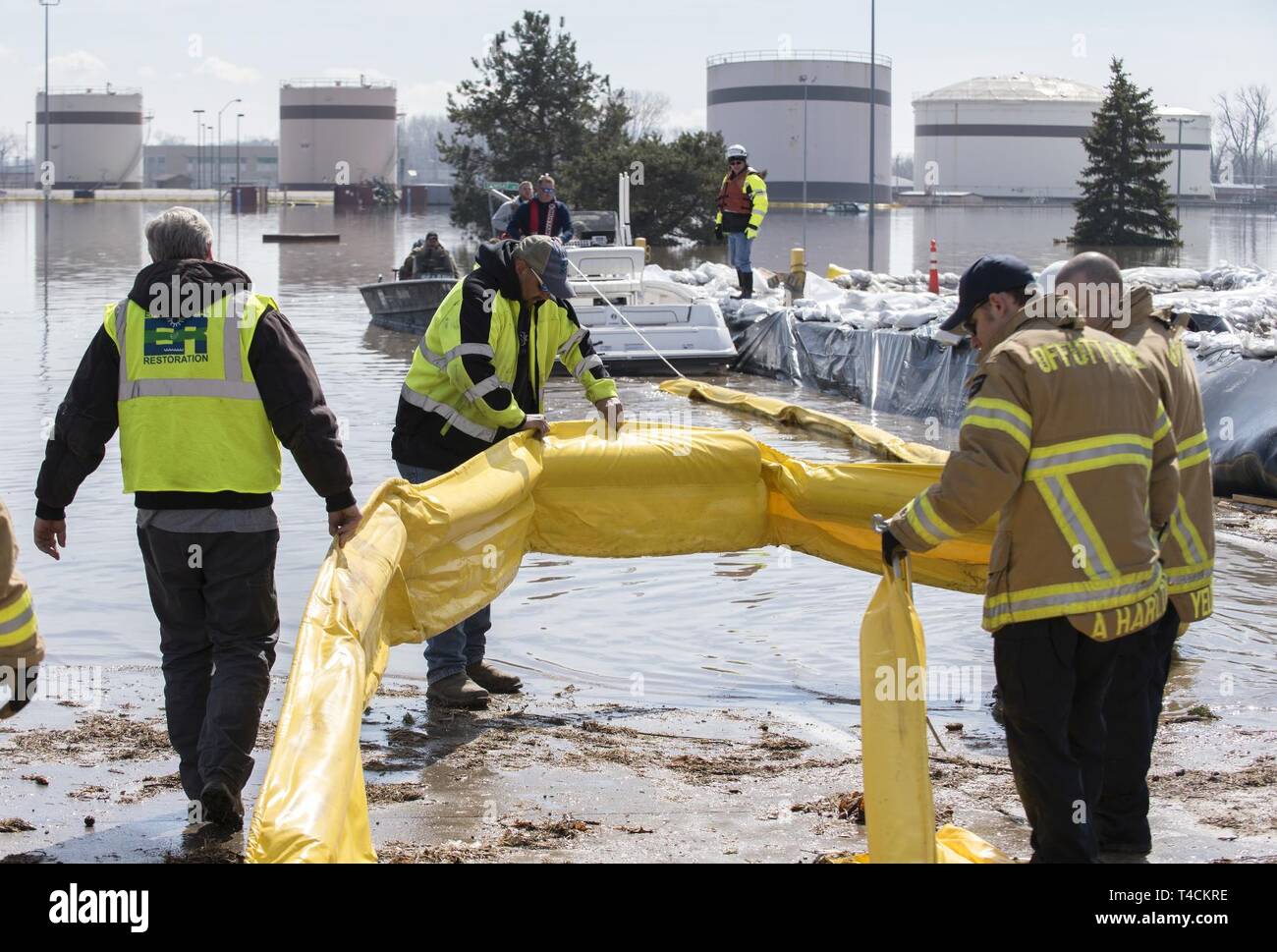Contracted employees of the Environmental Restoration, LLC company ...