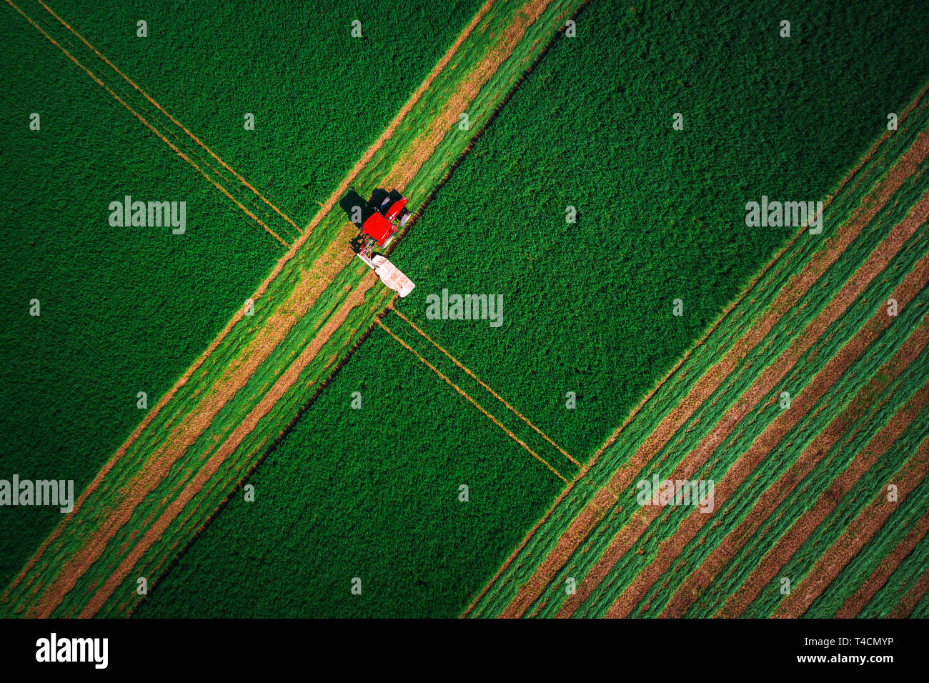 Mowing the field hi-res stock photography and images - Alamy