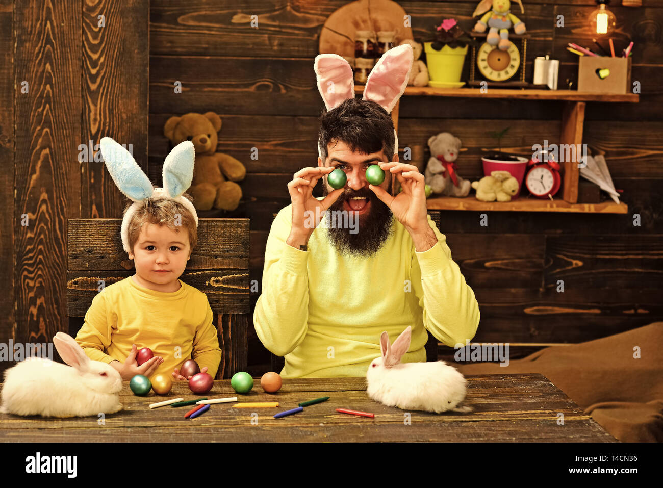 Easter family with fake bunny ears Stock Photo - Alamy