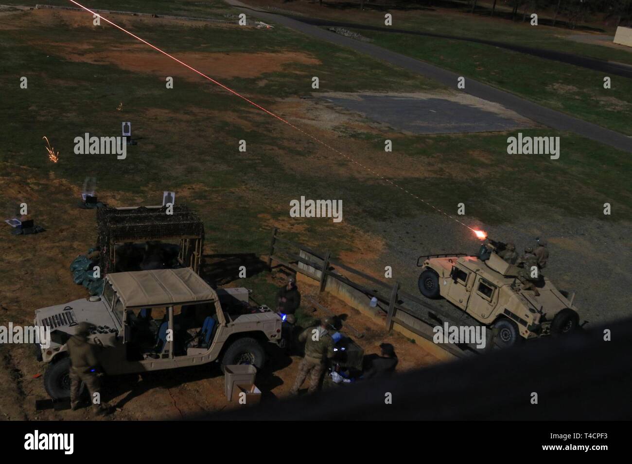 Competitors engage targets on a night live-fire range in the United ...