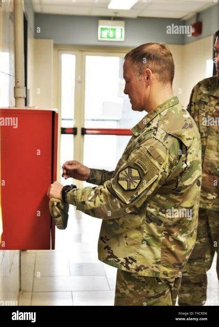 USAG Italy Garrison Commander Col. Erik M. Berdy conducts an inspection ...