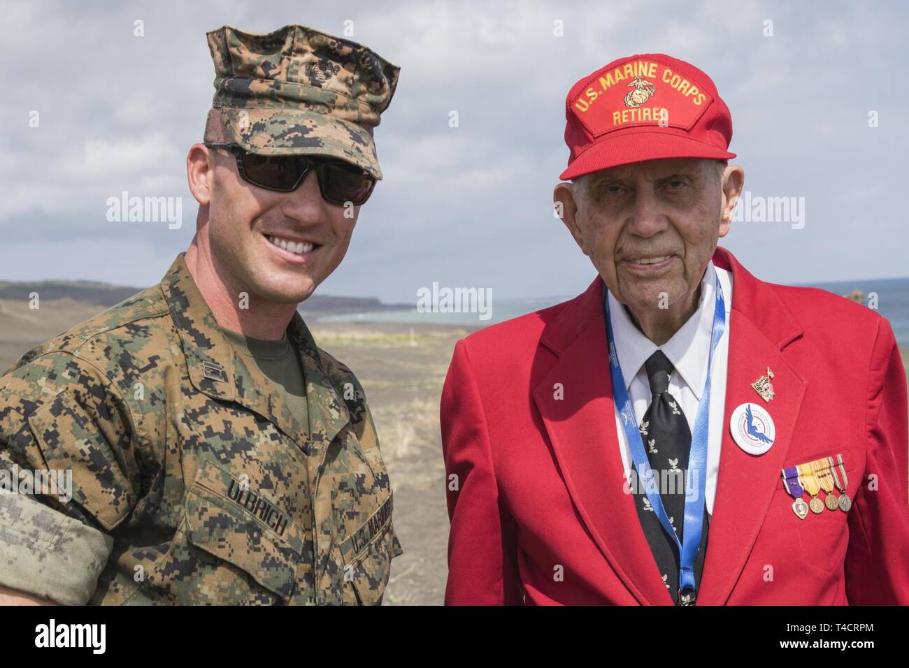 U.S. Marine Corps Capt. Kristopher Ulbrich, left, and Dean Ladd, right ...