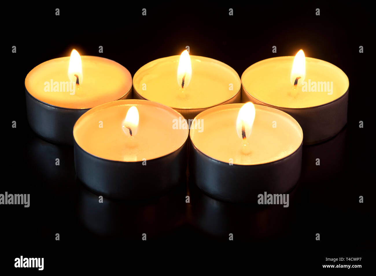 Five candles looking as symbol of Olympic games Stock Photo - Alamy
