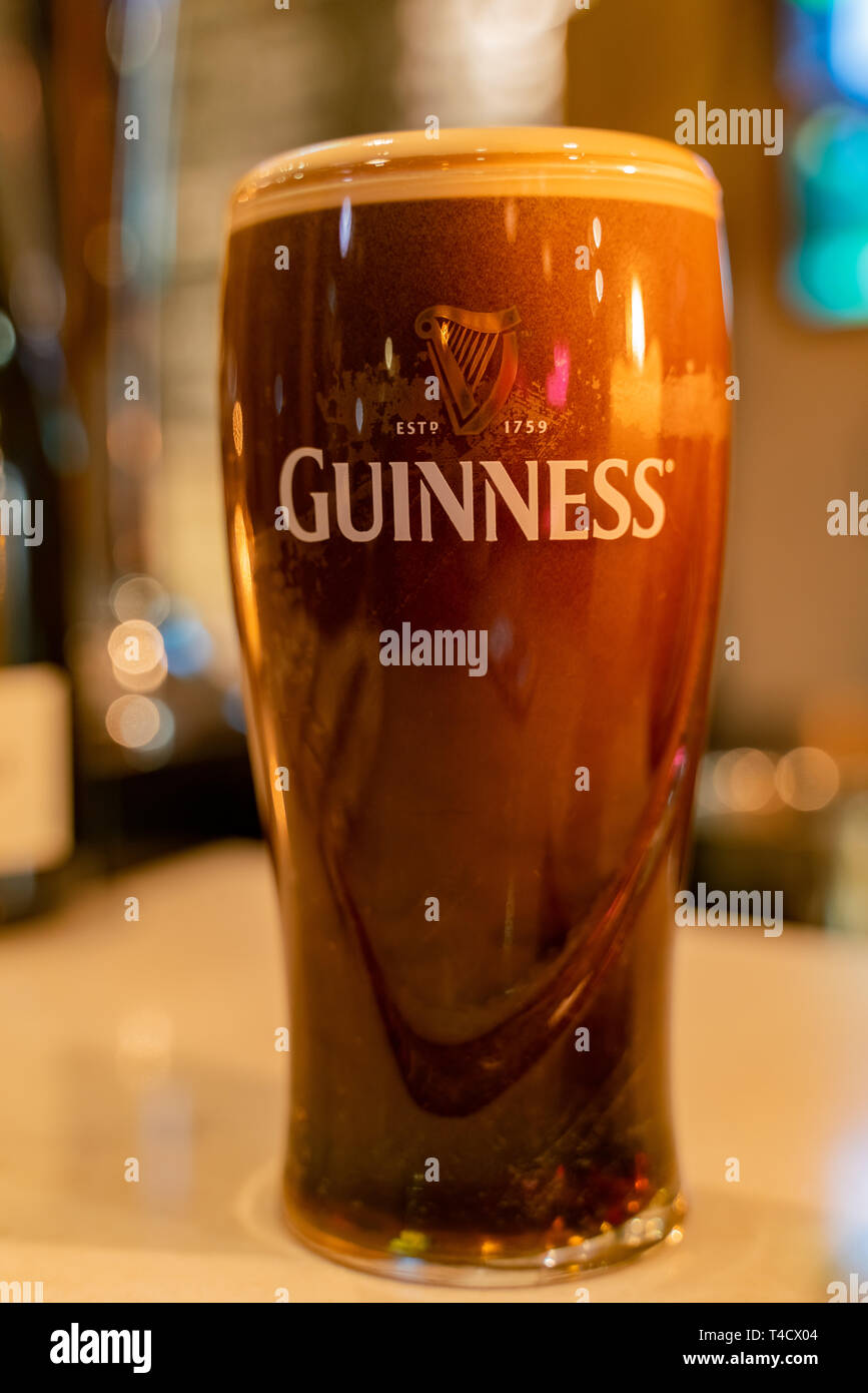 Dublin, OCT 28: Close up shot of a glass of the famous Guinness beer on ...