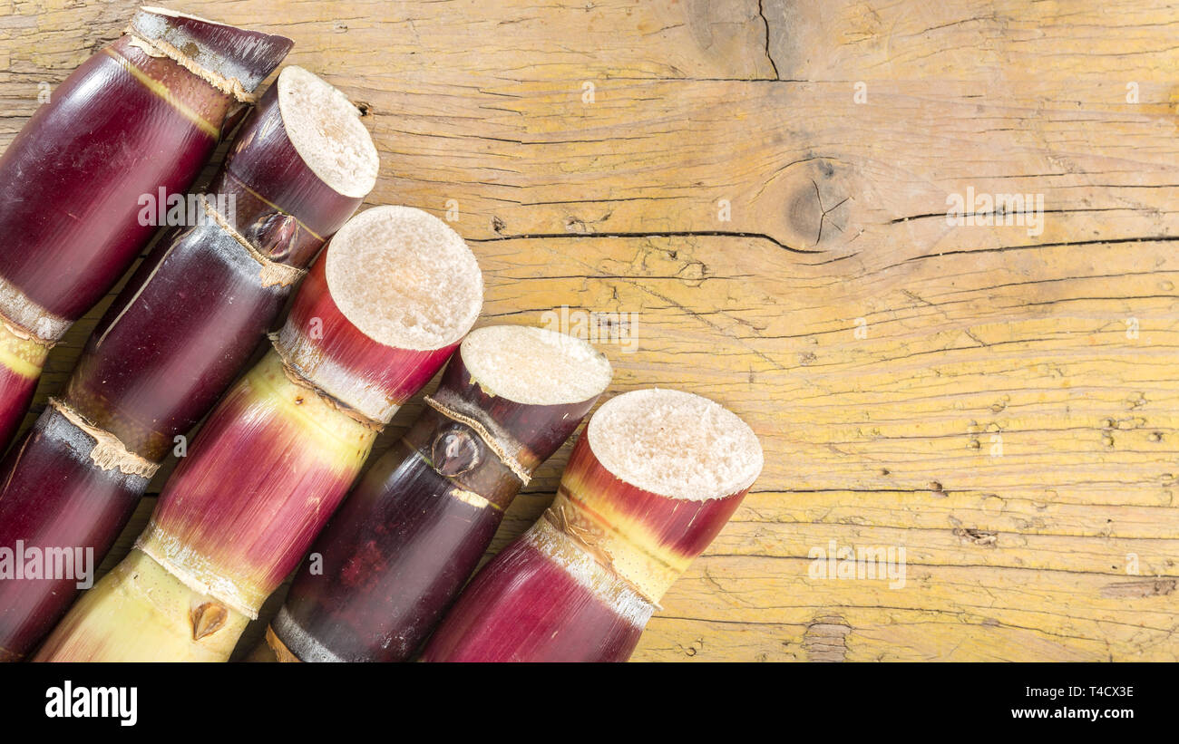 stack of sugar cane on the table, top view Stock Photo - Alamy