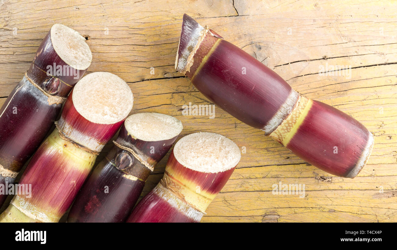 stack of sugar cane on the table, top view Stock Photo - Alamy