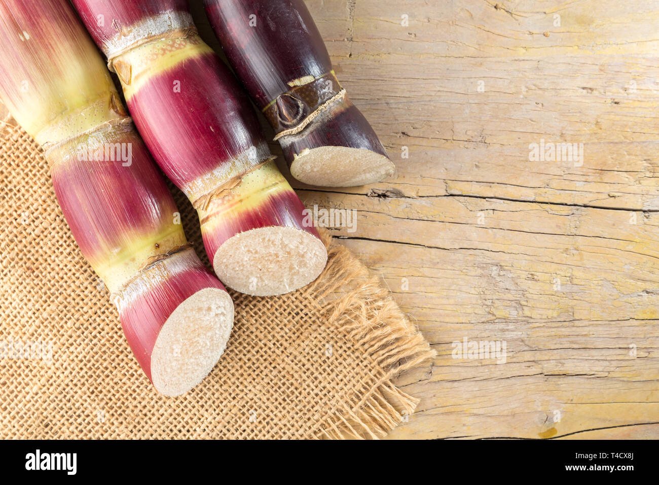 stack of sugar cane on the table, top view Stock Photo - Alamy