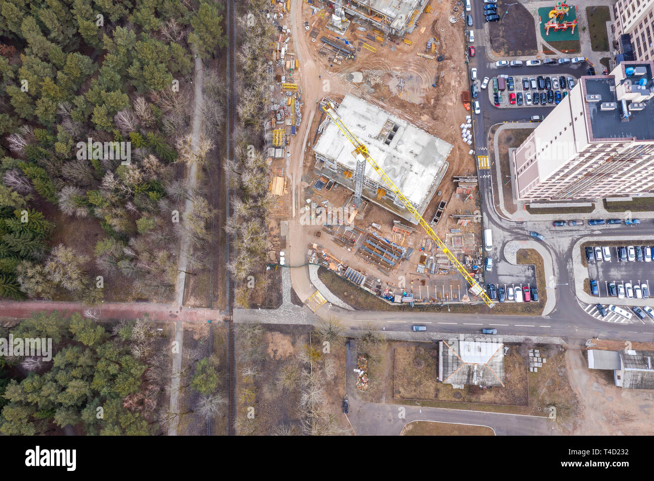 aerial top view of city construction site with industrial equipment and ...