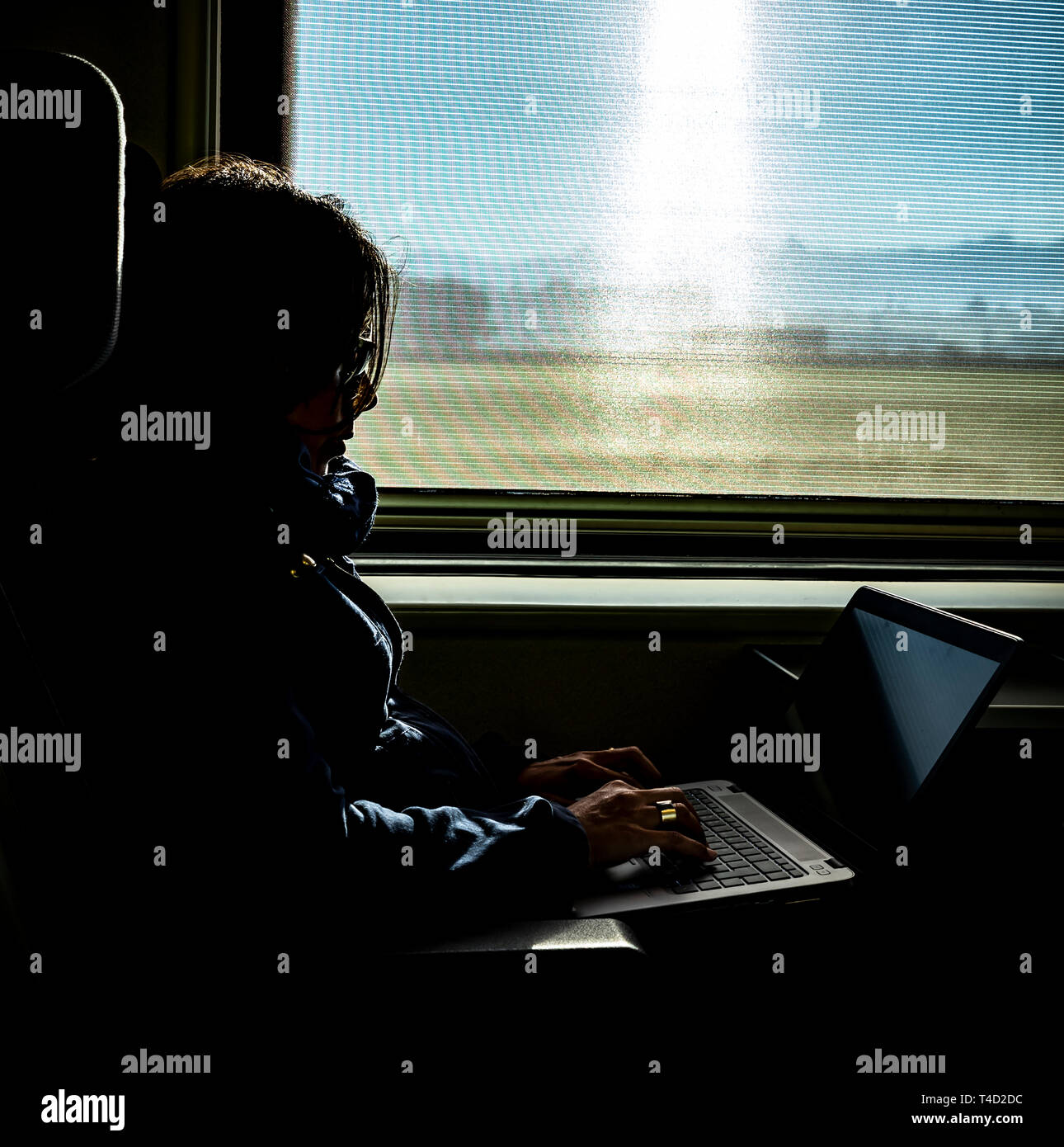 Commuter train people working hi-res stock photography and images - Alamy