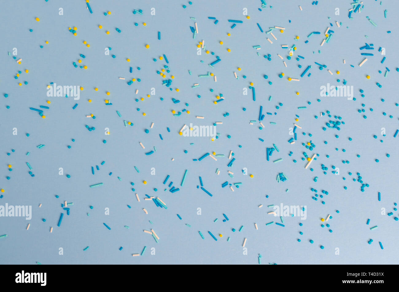 Sprinkles on blue background. Texture and background concept Stock ...