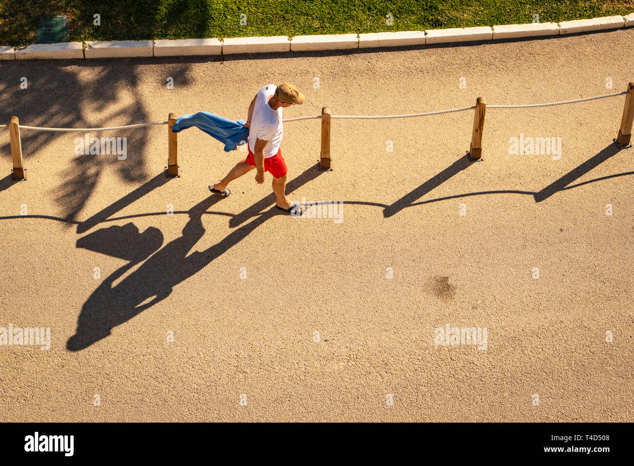 Man walking on paving hi-res stock photography and images - Alamy