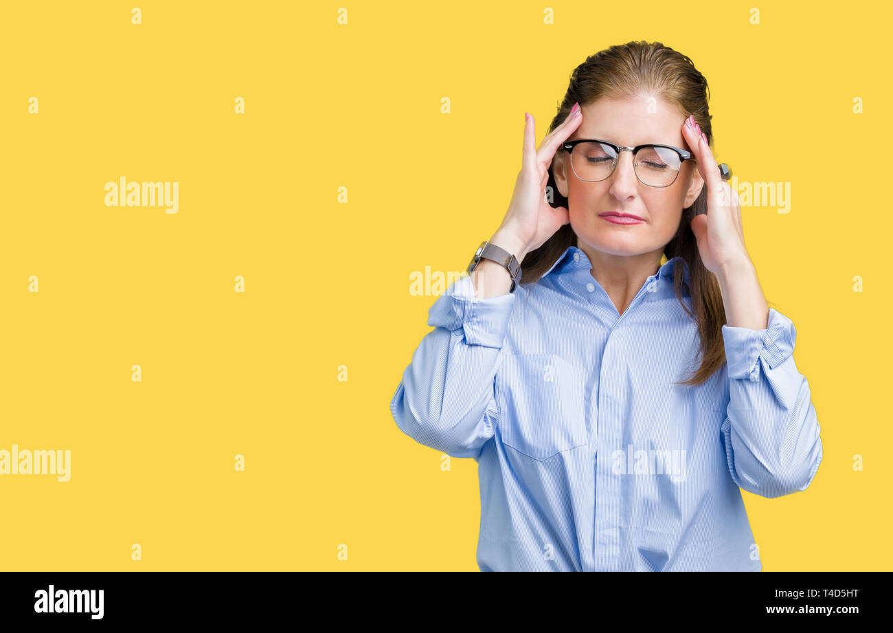 Beautiful middle age mature business woman wearing glasses over ...