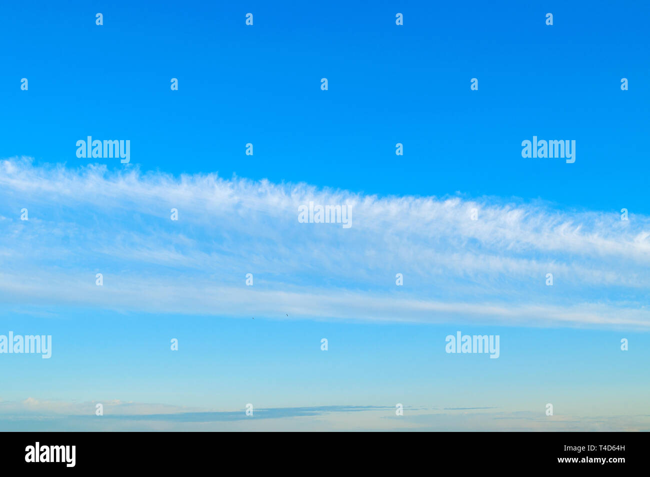 Blue sky background with white dramatic colorful clouds and sunlight ...