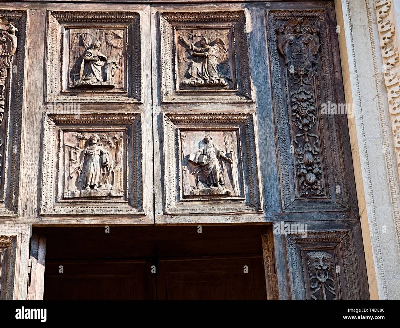 Carved wooden door catholic church hi-res stock photography and images ...