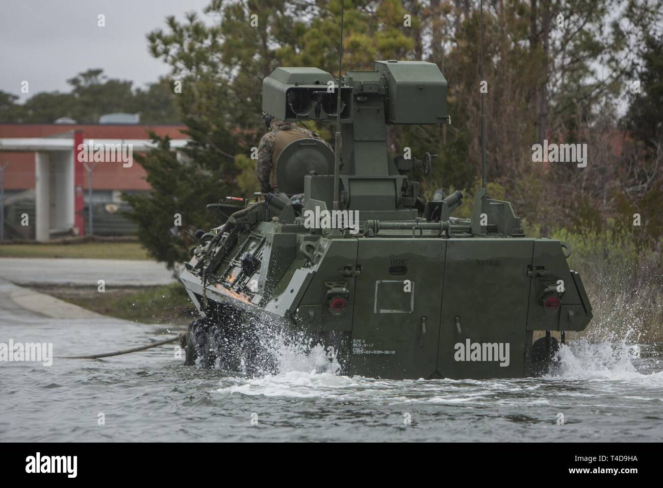 U.S. Marines with Company C, 2nd Light Armored Reconnaissance Battalion ...