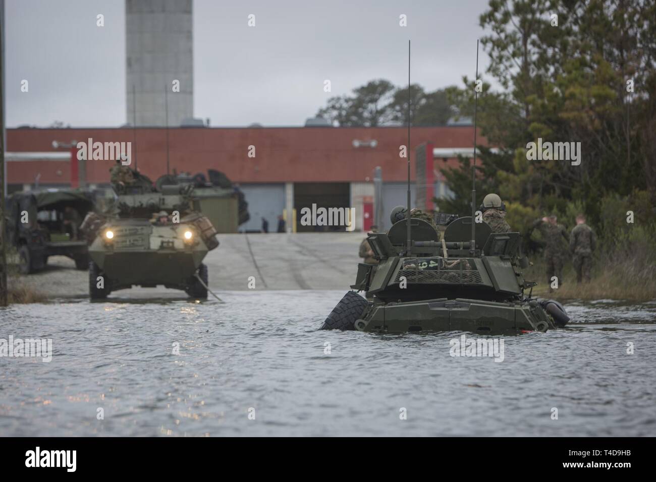 U.S. Marines with Company C, 2nd Light Armored Reconnaissance Battalion ...