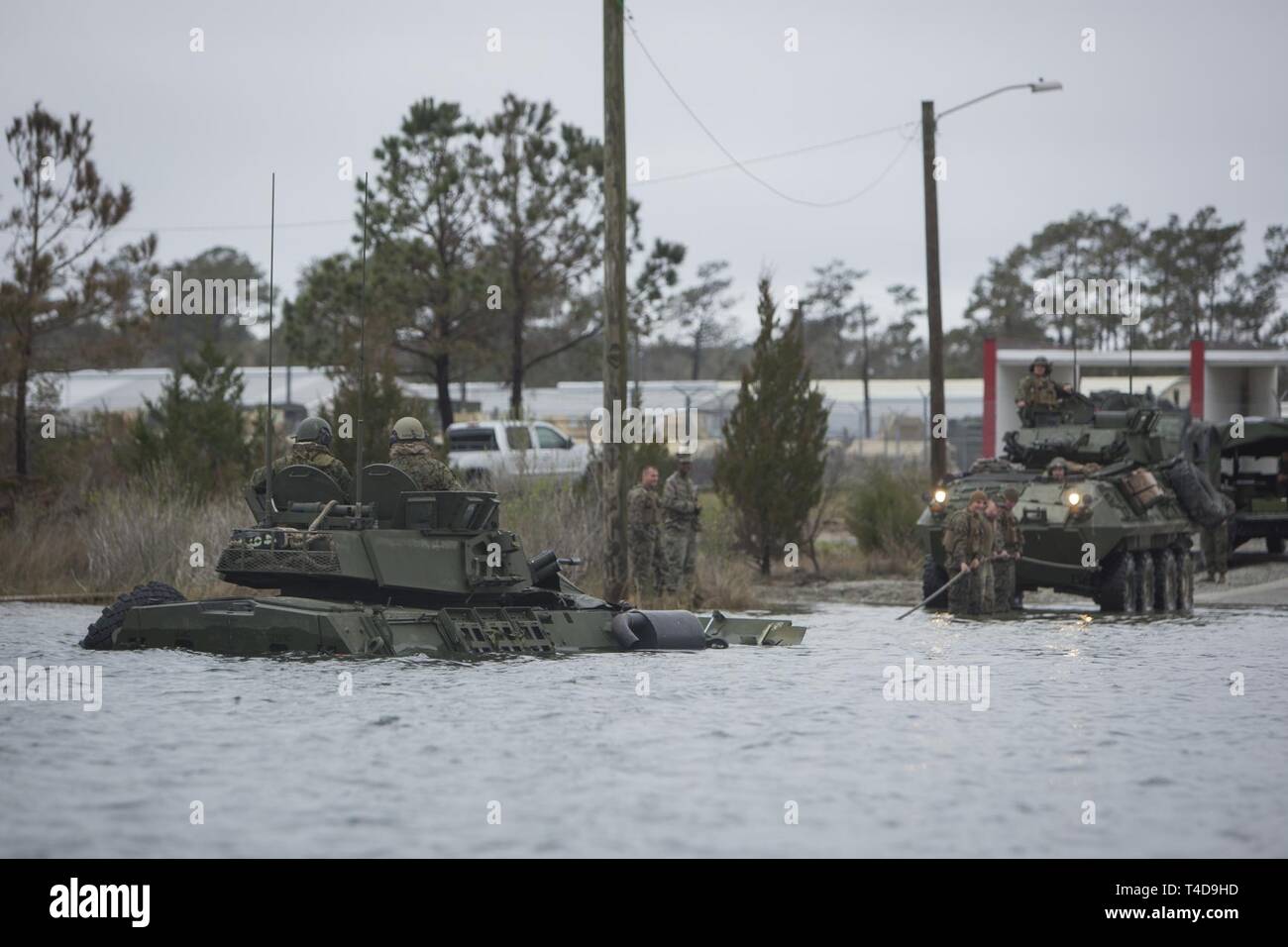 U.S. Marines with Company C, 2nd Light Armored Reconnaissance Battalion ...