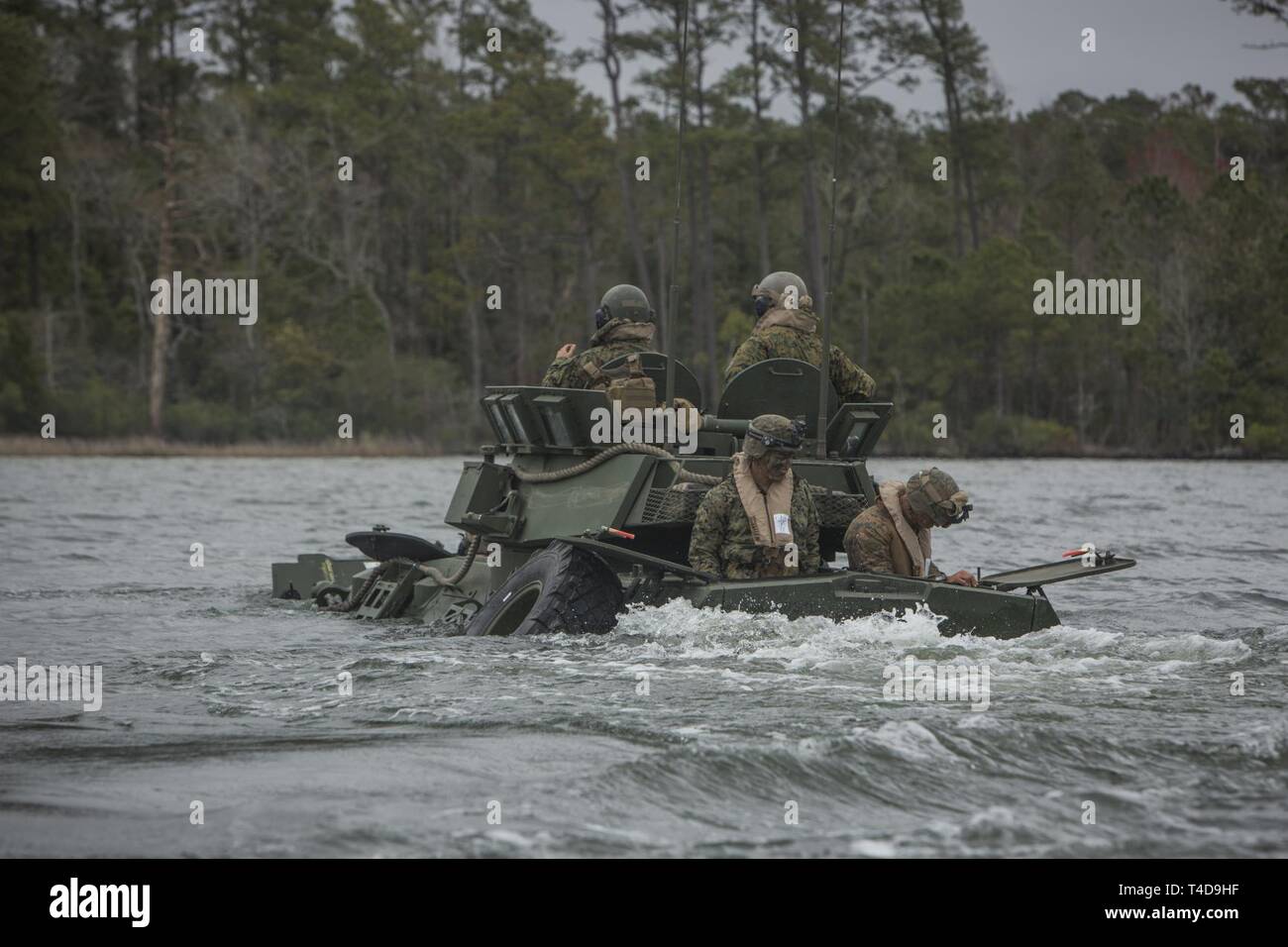U.S. Marines with Company C, 2nd Light Armored Reconnaissance Battalion ...