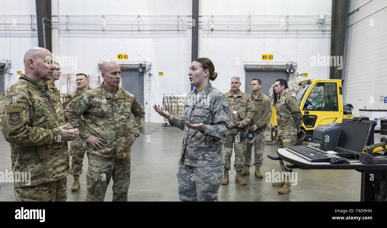 In the center, Staff Sgt. Alyssa Aschemann, 436th Aerial Port Squadron ...