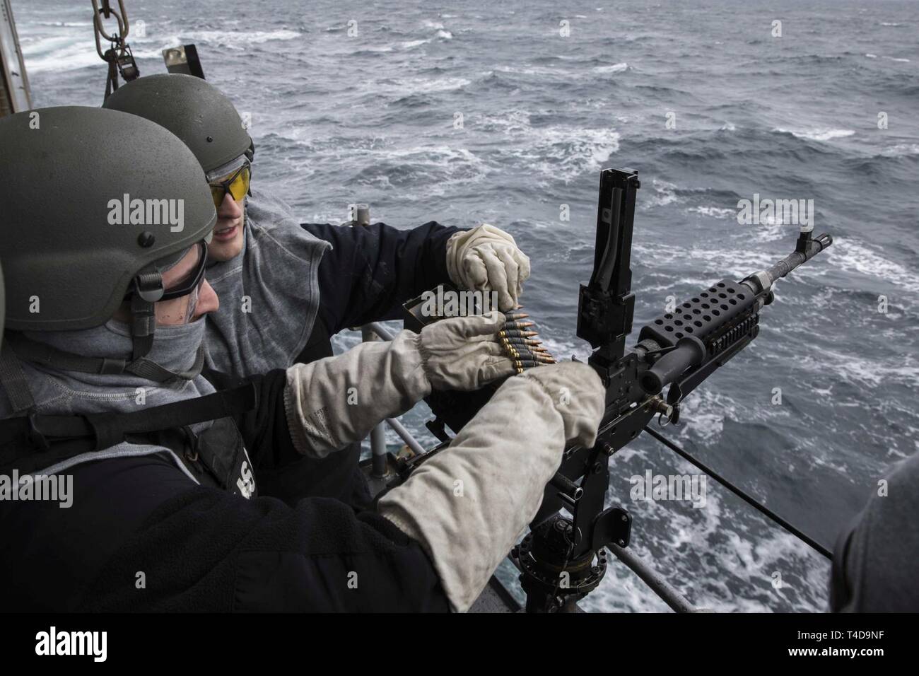 OCEAN (Mar. 20, 2019) Gunner's Mate Second Class Matthew Strong and ...