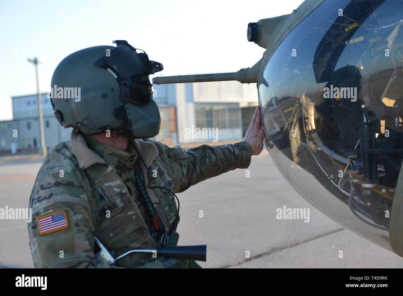 Sgt. Dallas Kimminau, a flight engineer with Company B, 2-135th General ...