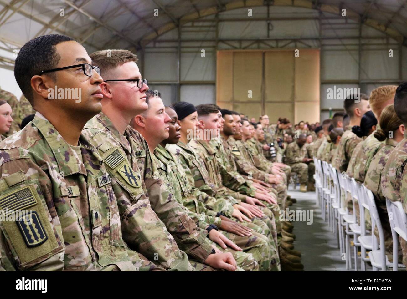 Spc. Sean Lam and Cpl. Jake Merriman, both of the 529th Support ...