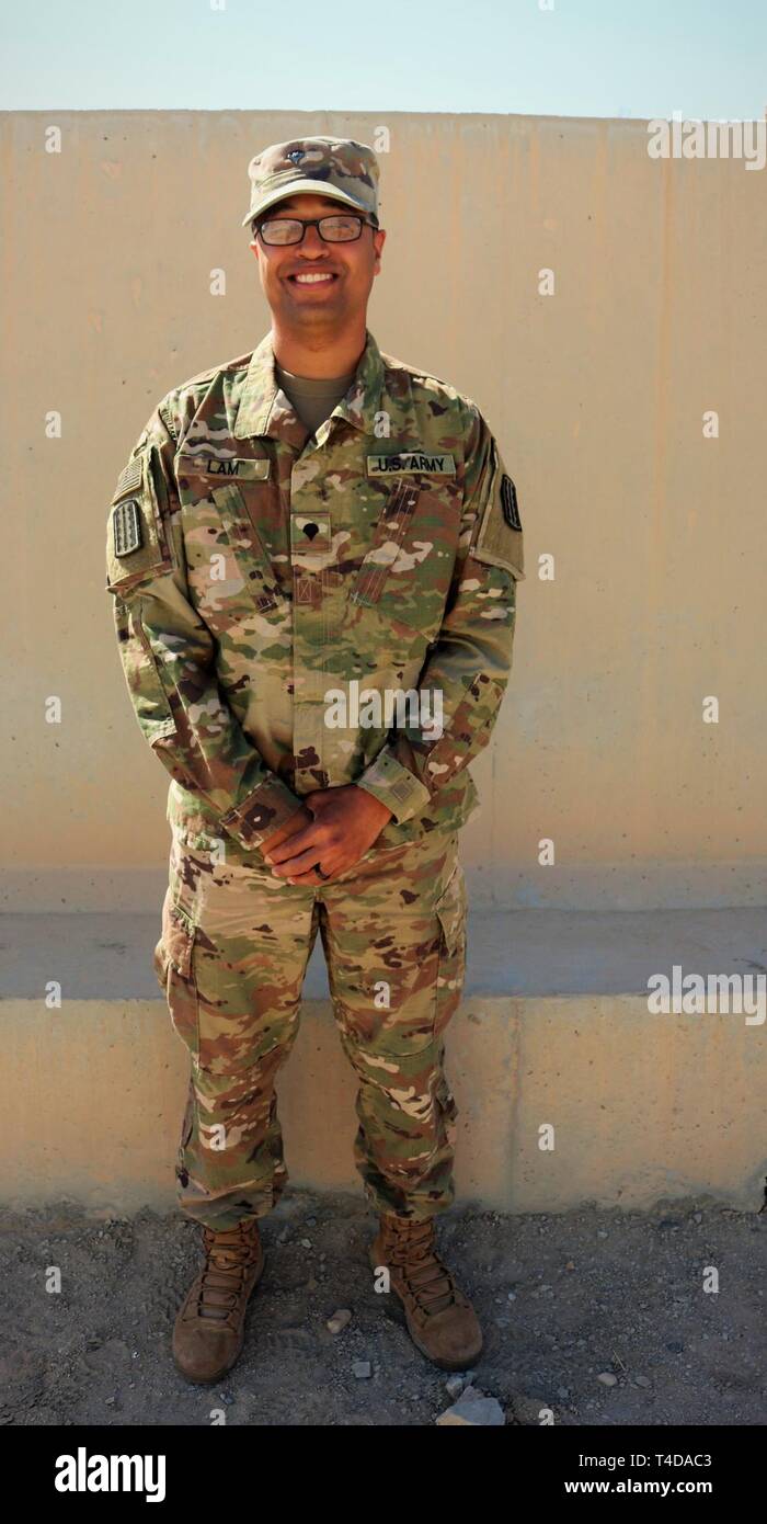 Spc. Sean Lam, 529th Support Battalion, stands tall for an individual ...