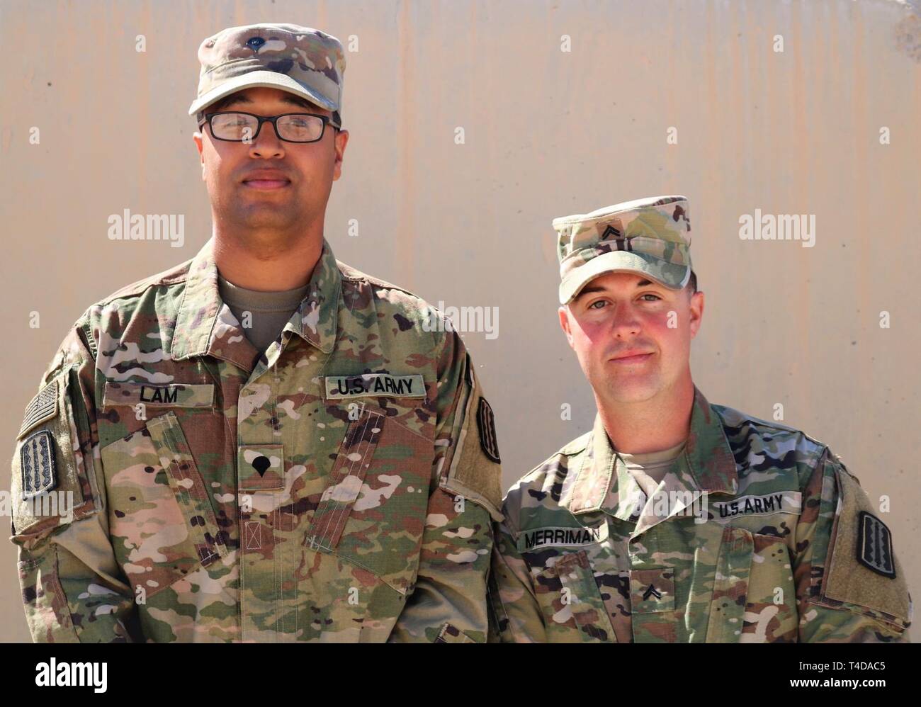 Spc. Sean Lam and Cpl. Jake Merriman, 529th Support Battalion, come ...