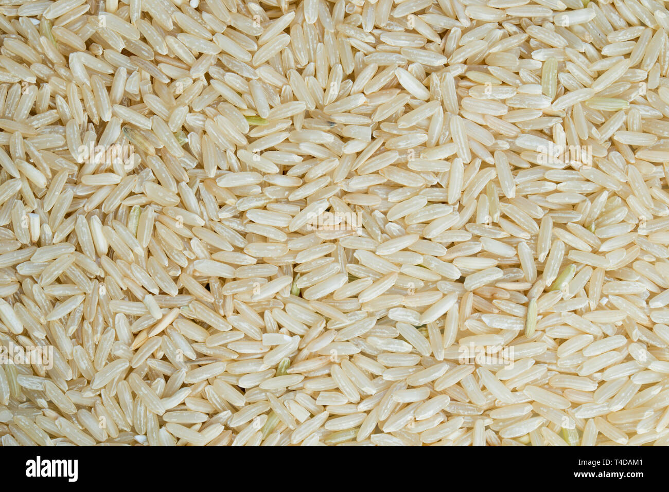 raw dried organic brown rice healhty food background Stock Photo - Alamy