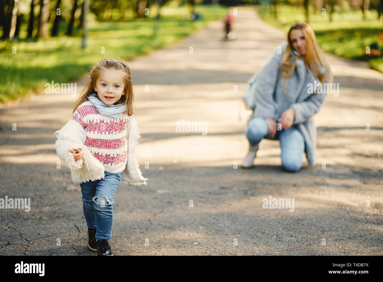 Little girl running behind little hi-res stock photography and images ...