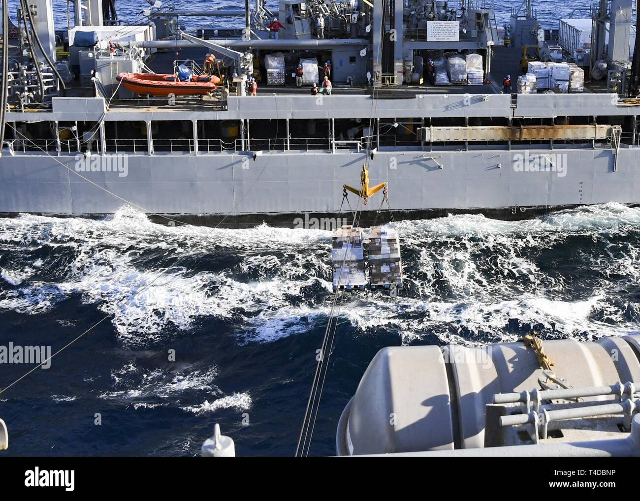OCEAN (March 23, 2019) Amphibious assault ship USS Boxer (LHD 4) takes ...