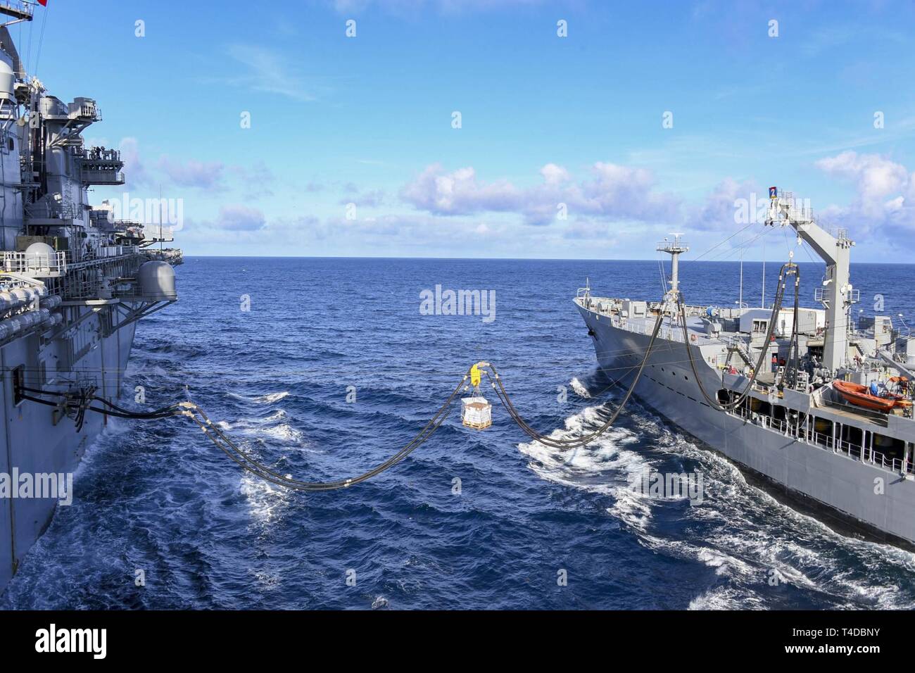 OCEAN (March 23, 2019) Amphibious assault ship USS Boxer (LHD 4) takes ...