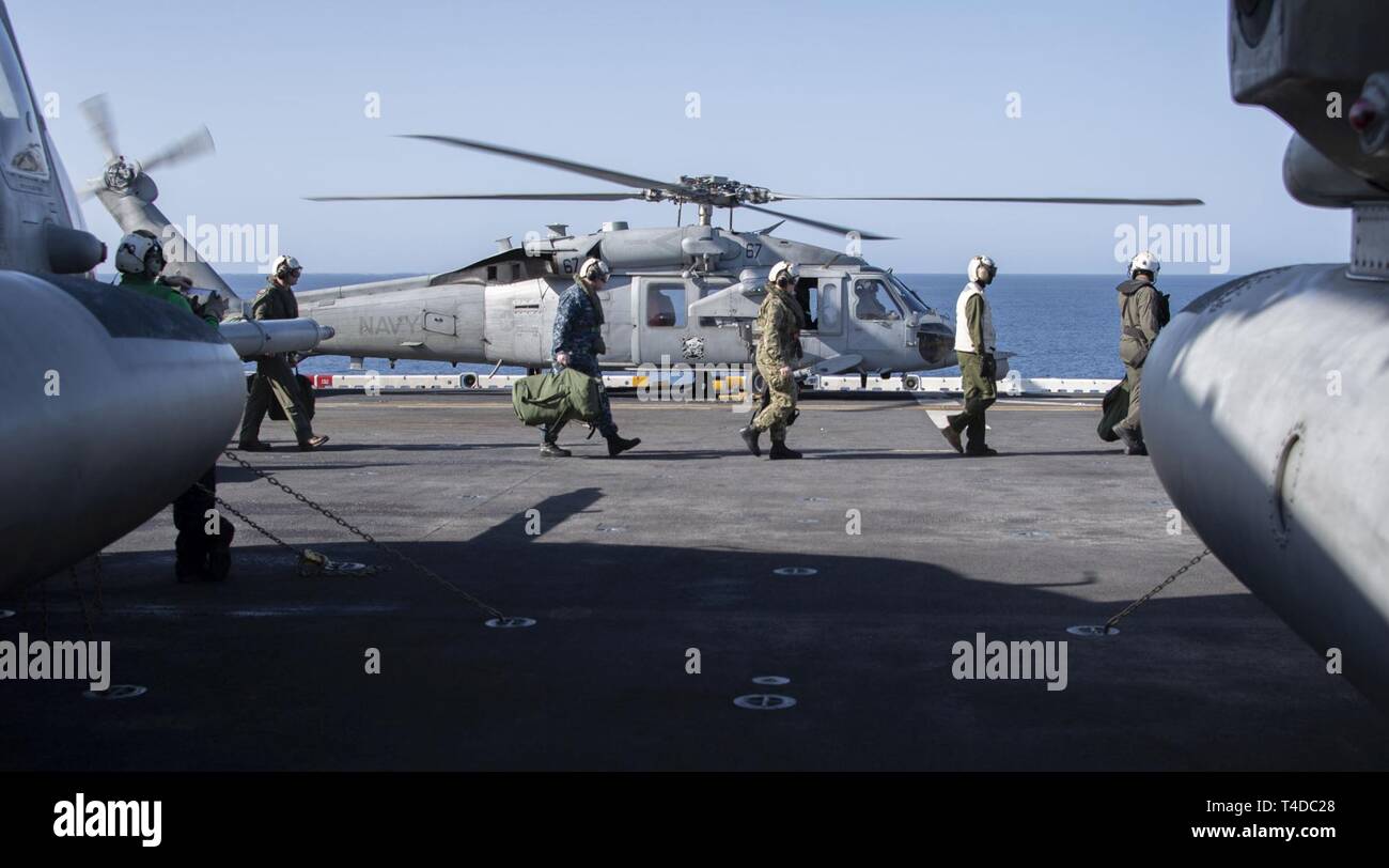 OCEAN (March 24, 2019) Sailors assigned to amphibious assault ship USS ...