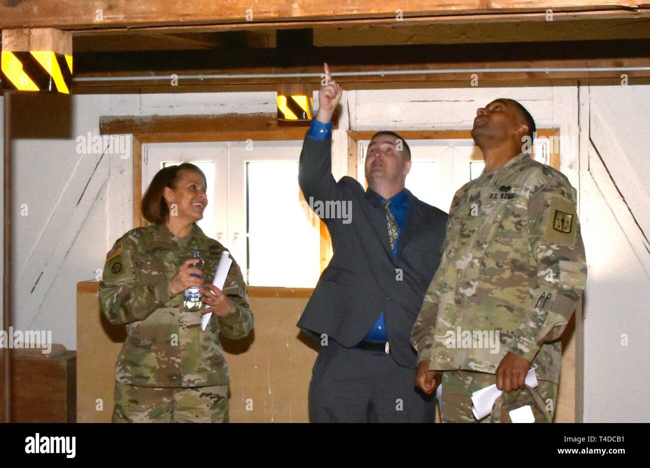 Johnathon L. Booth, center, a general Supply Specialist with the ...