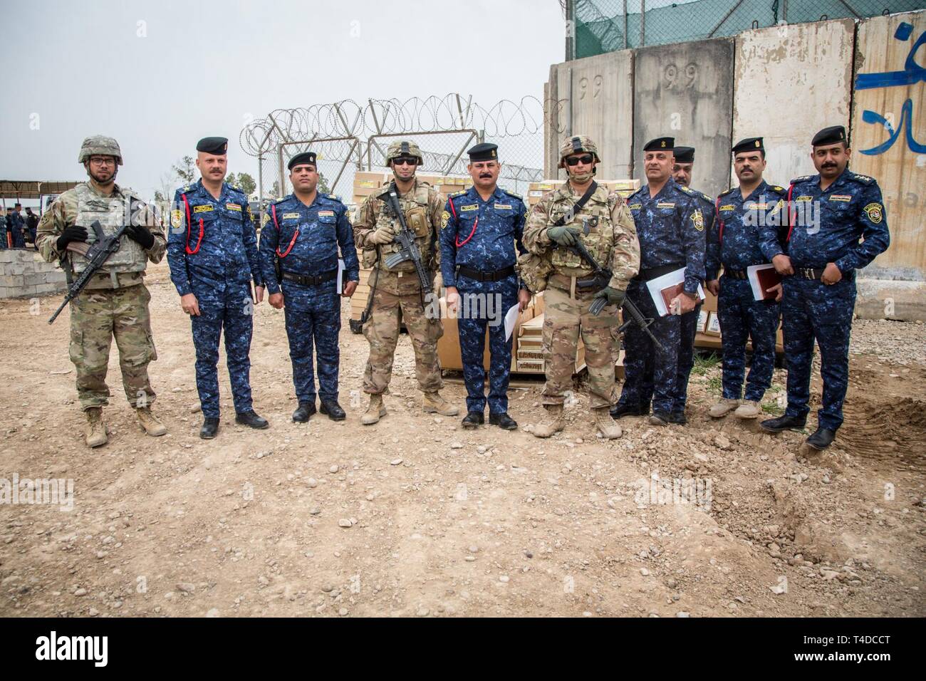 U.S. Soldiers transfers over various tactical equipment used to help in ...