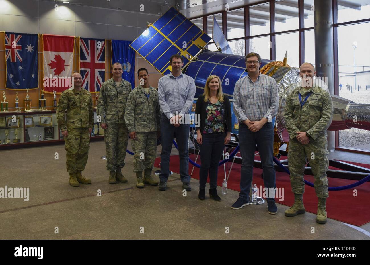 460th Operations Group leadership poses for a photo with Jonathan Lowe ...