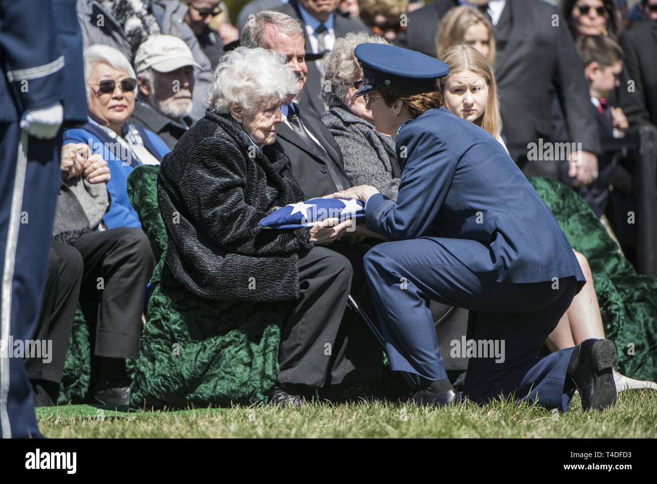 Rosamond Jackson recieves the U.S. flag during the funeral of her ...