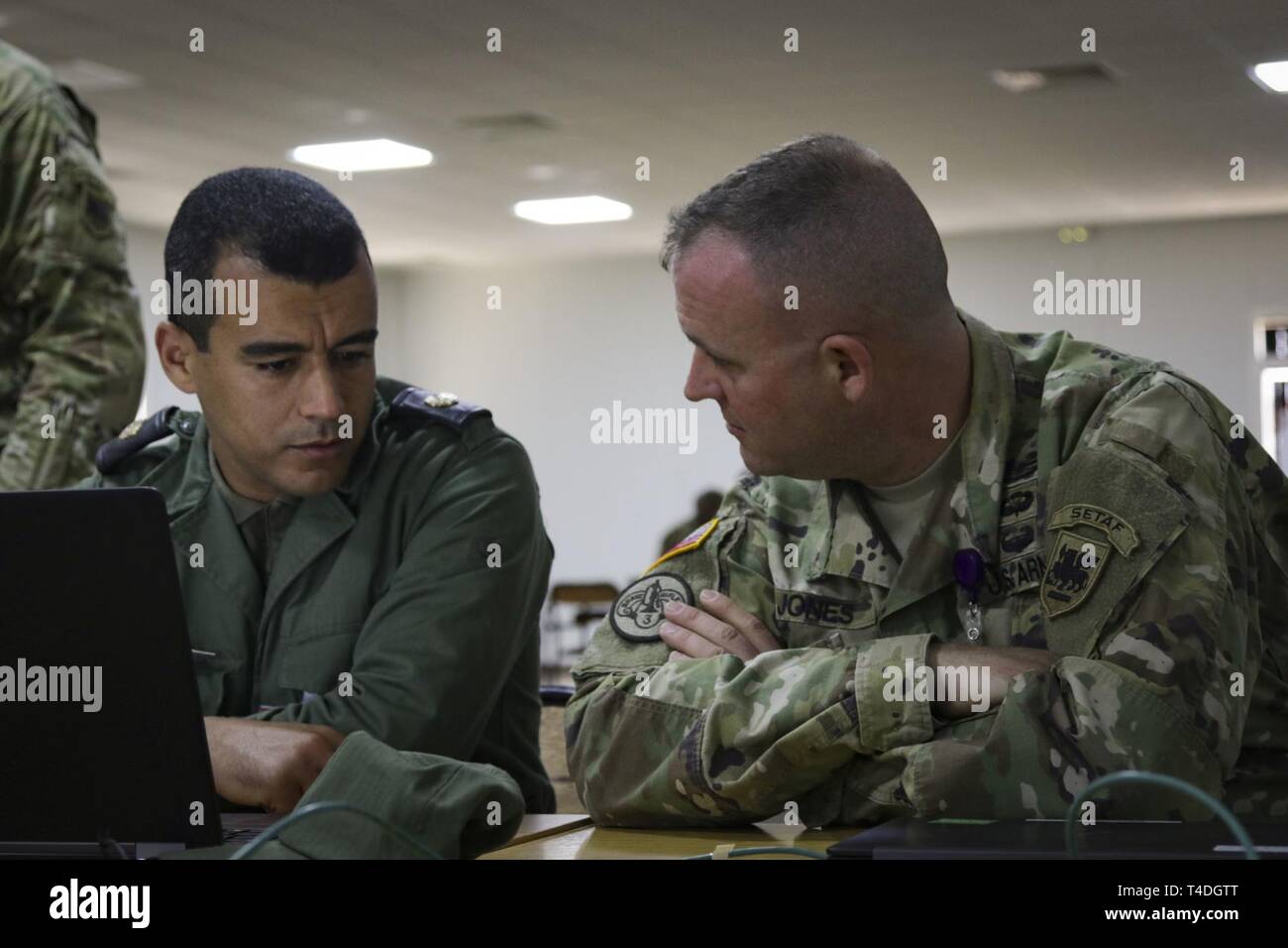 Major Jerry Jones (right), a U.S. Army engineer operations officer with ...