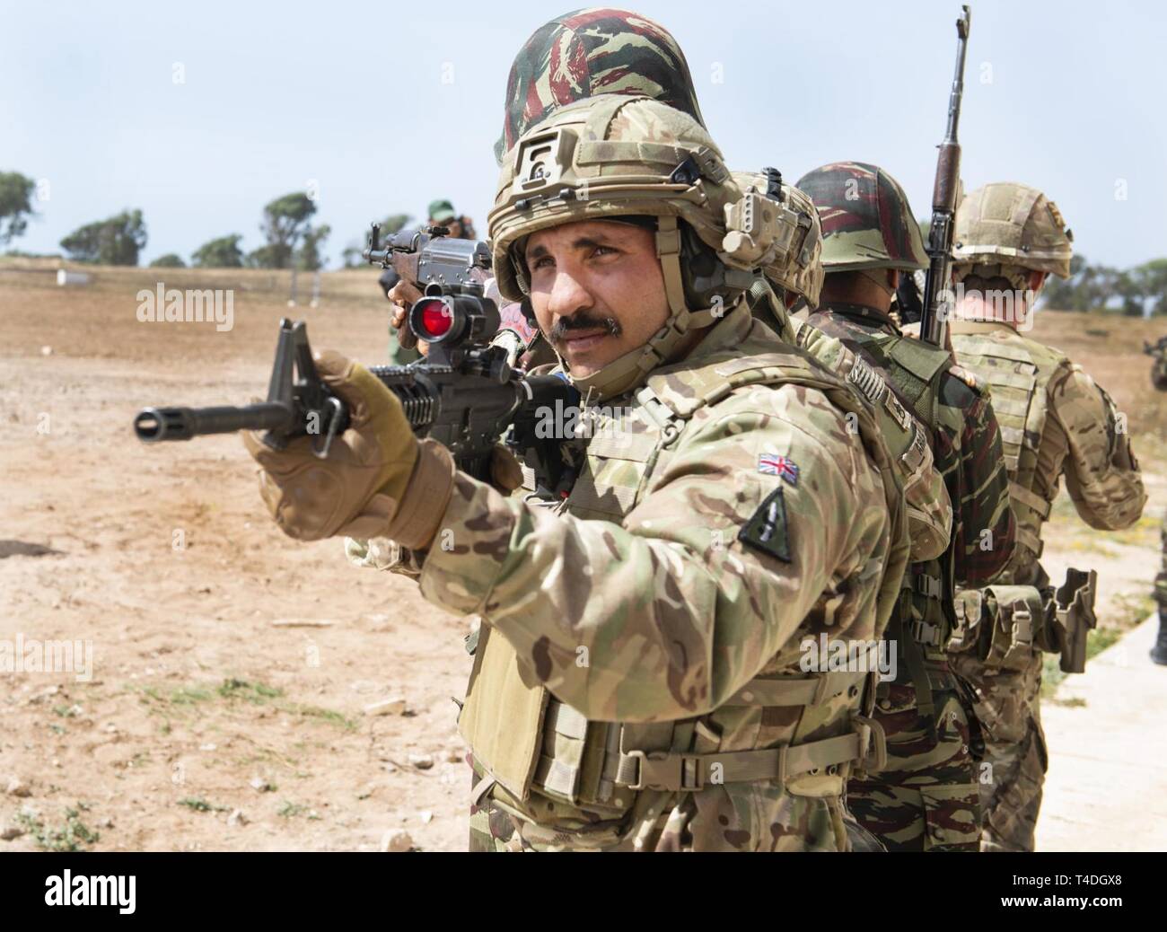 British Army Cpl. Mark Zareh with 4 Rifles, Bravo Company, practices ...