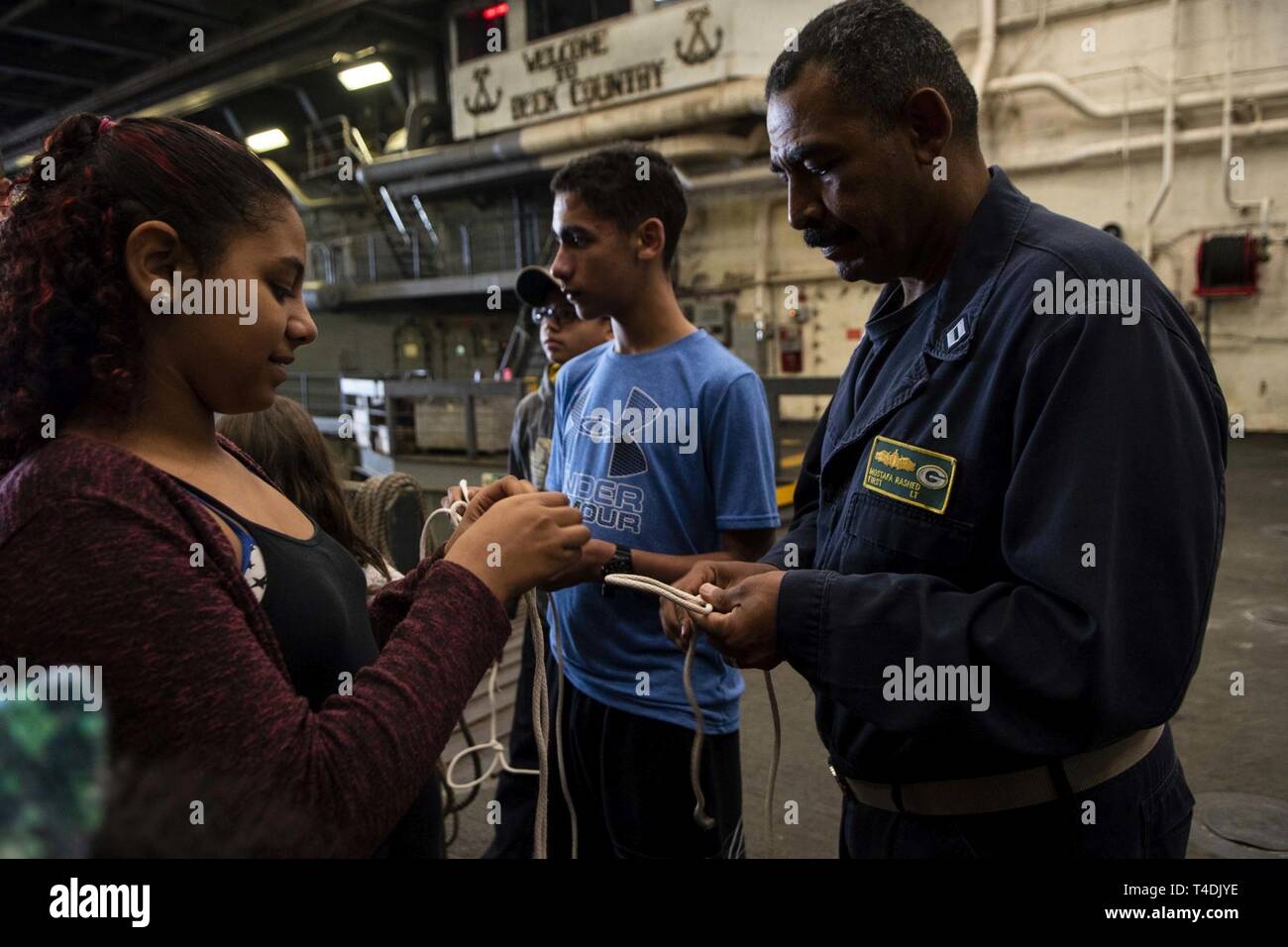 PHILIPPINE SEA (March 28, 2019) Lt. Mostafa Rashed teaches his daughter ...