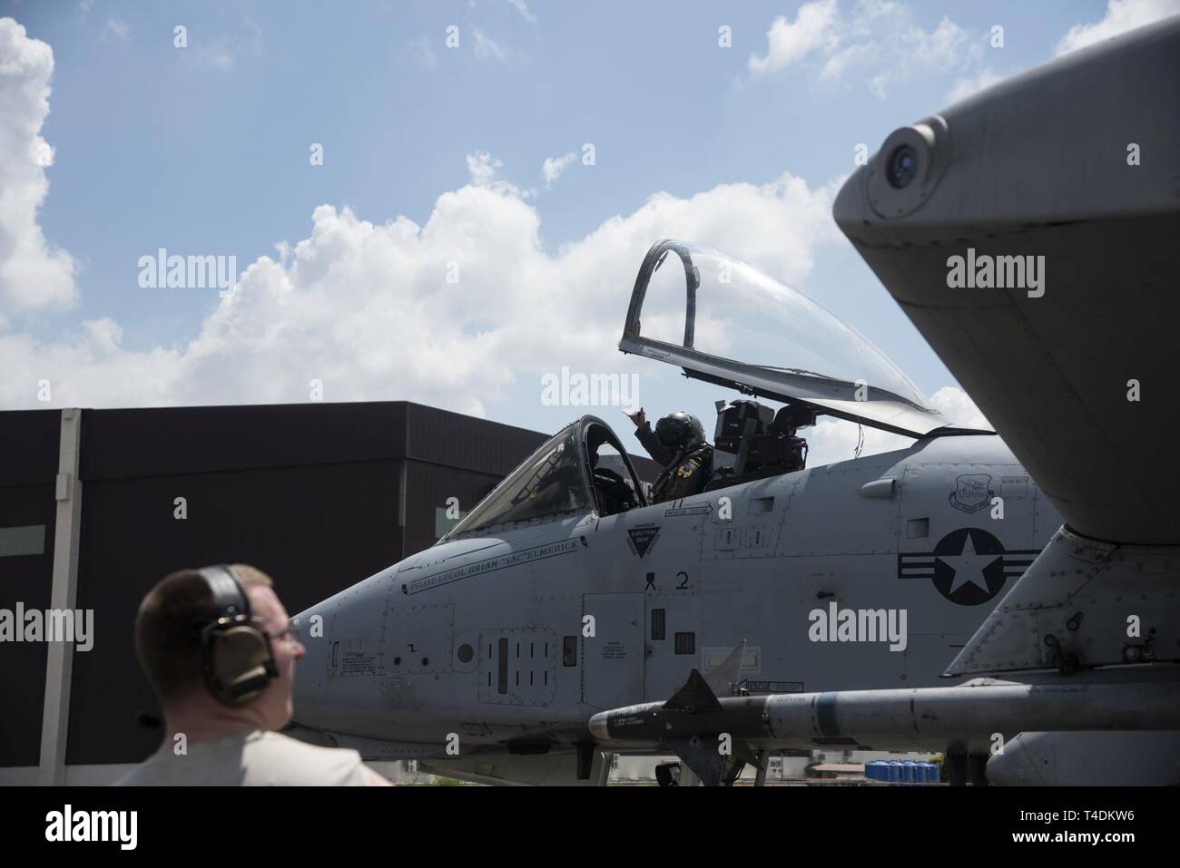 U.S. Air Force 1st Lt. Duck Yim signals as he taxis his A-10 ...